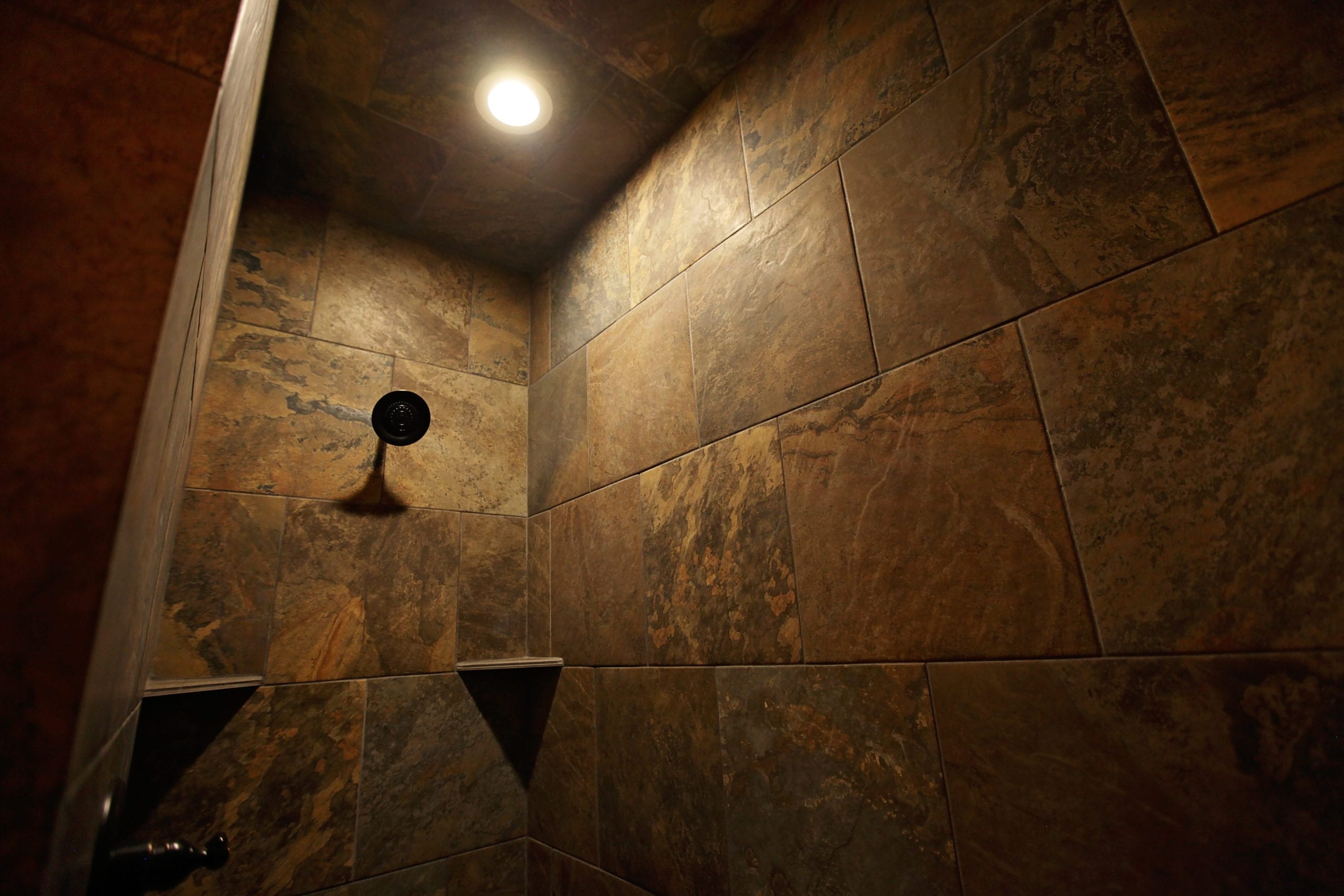 cabin bathroom with luxury tiled shower - Blue Beaver Cabins