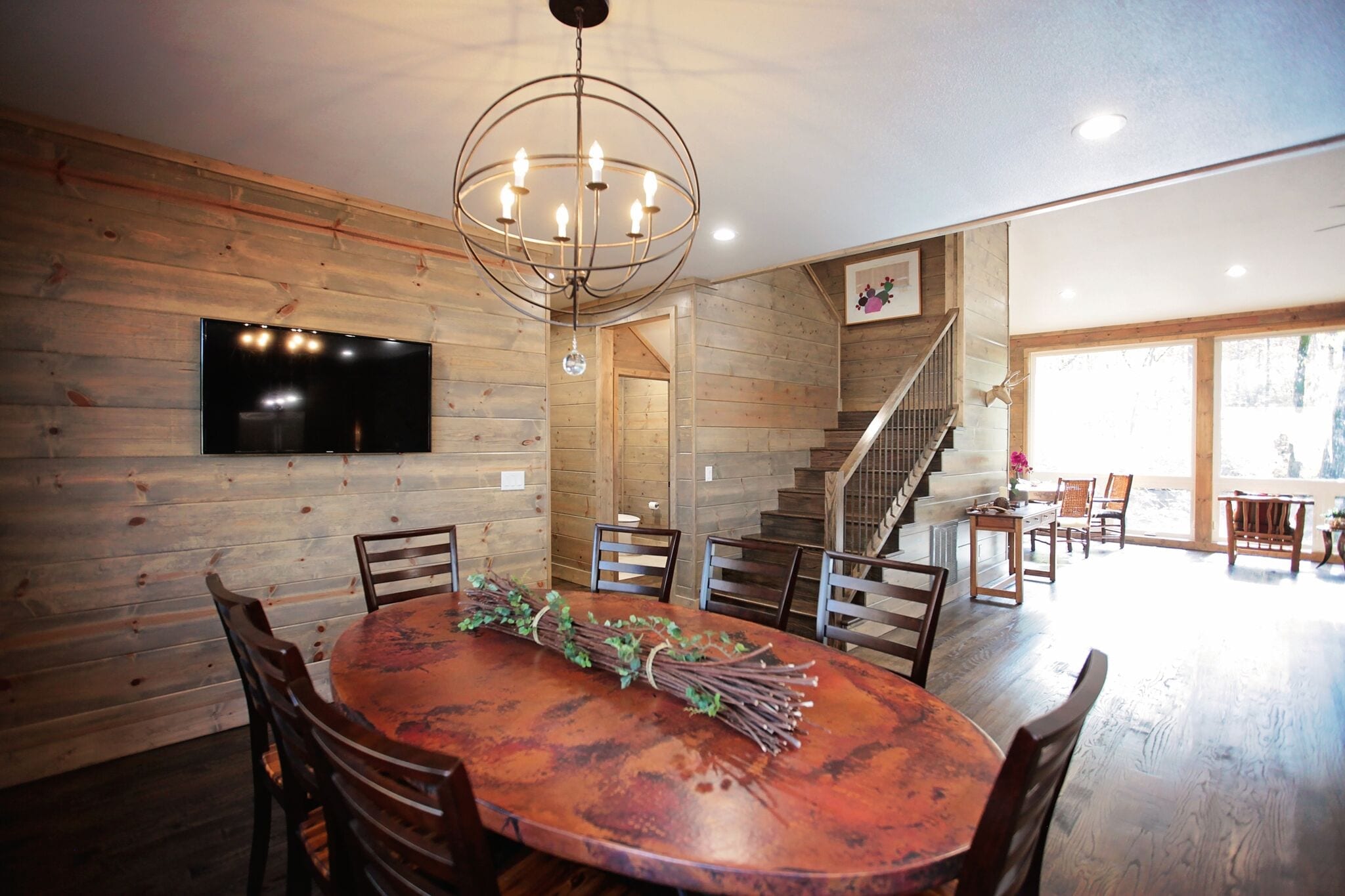 cabin dining table with centerpiece of decorative sticks - Blue Beaver ...