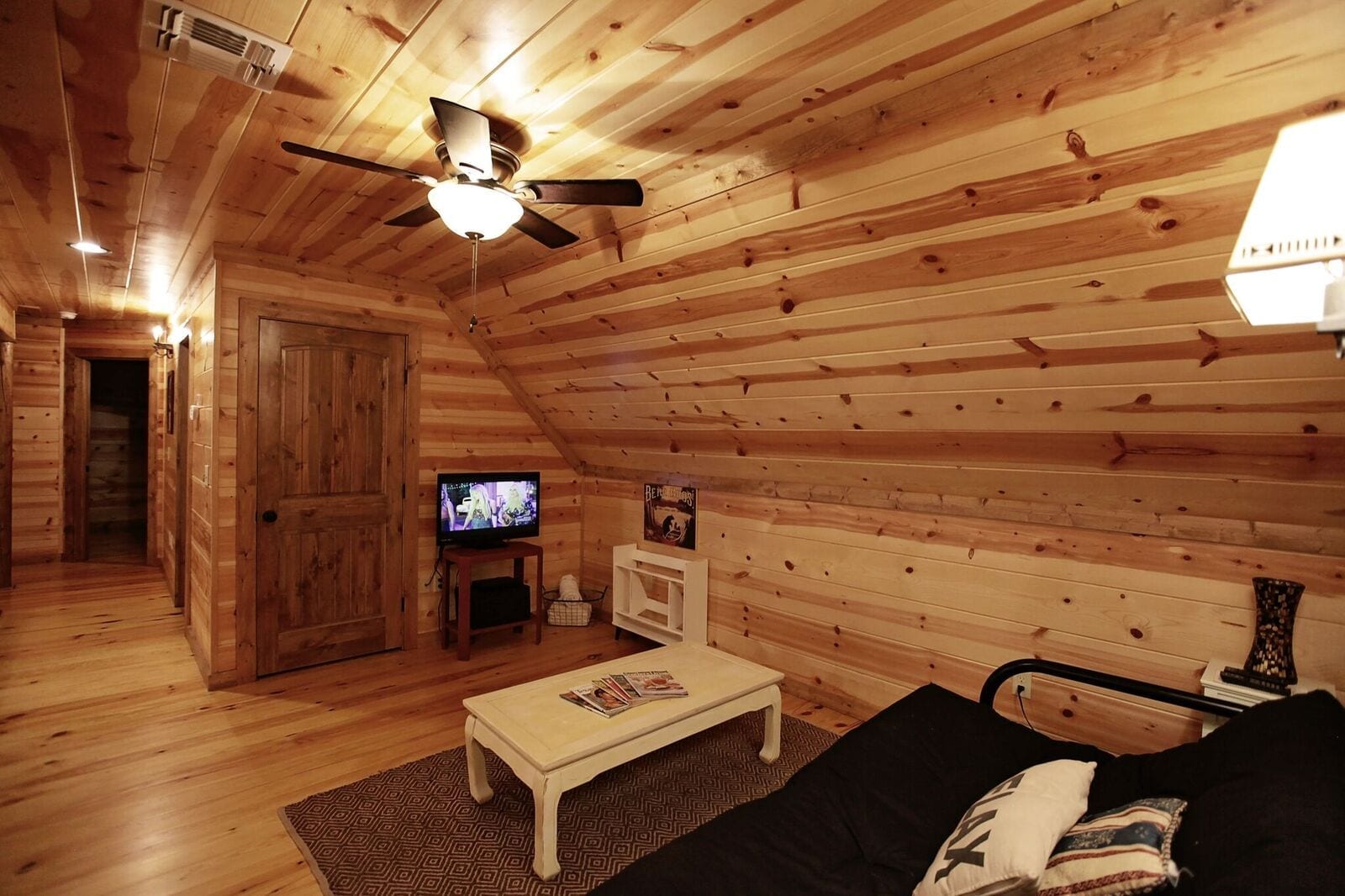 cabin loft lounge with futon - Blue Beaver Cabins