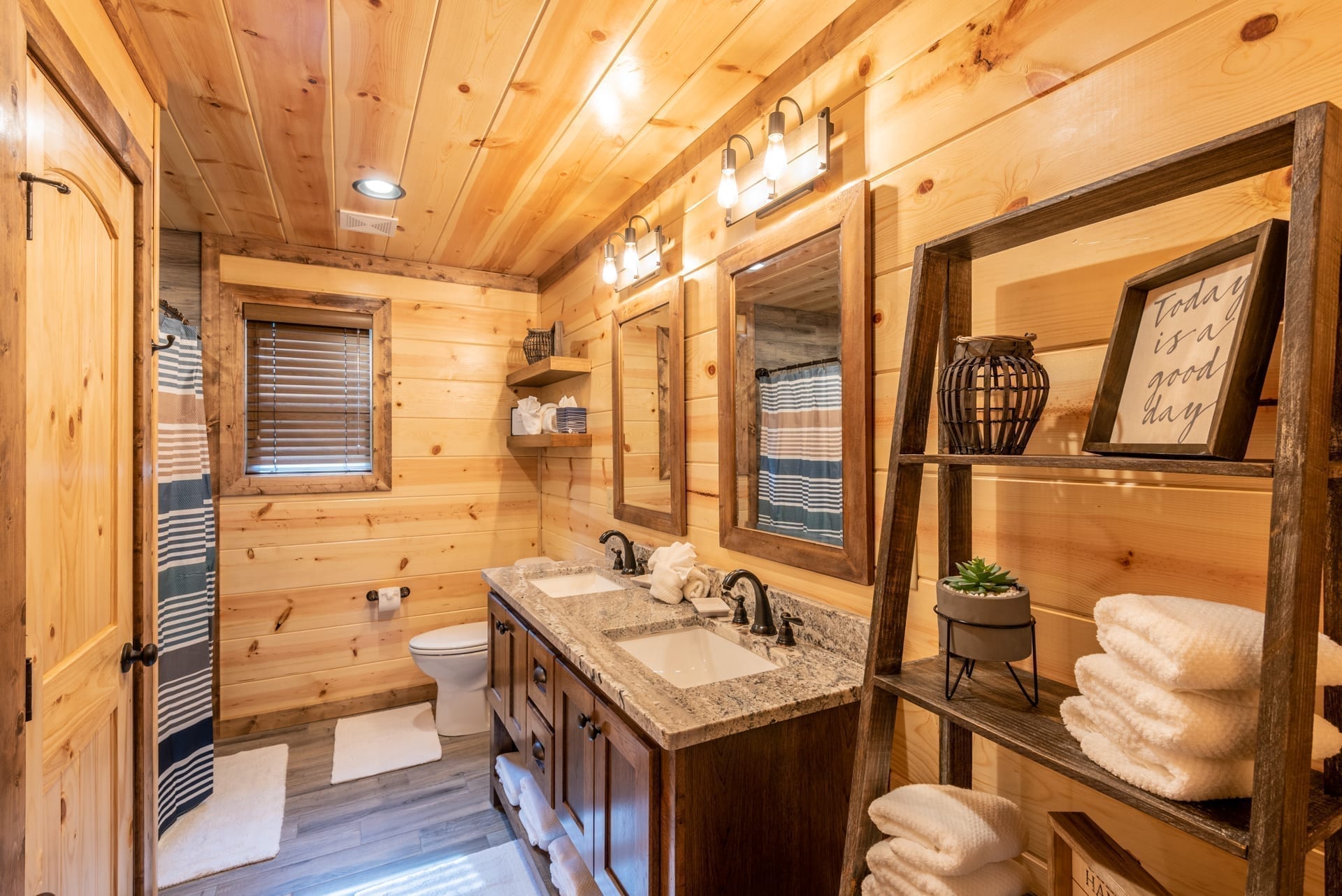 Cabin bathroom with dual vanity sinks - Blue Beaver Cabins